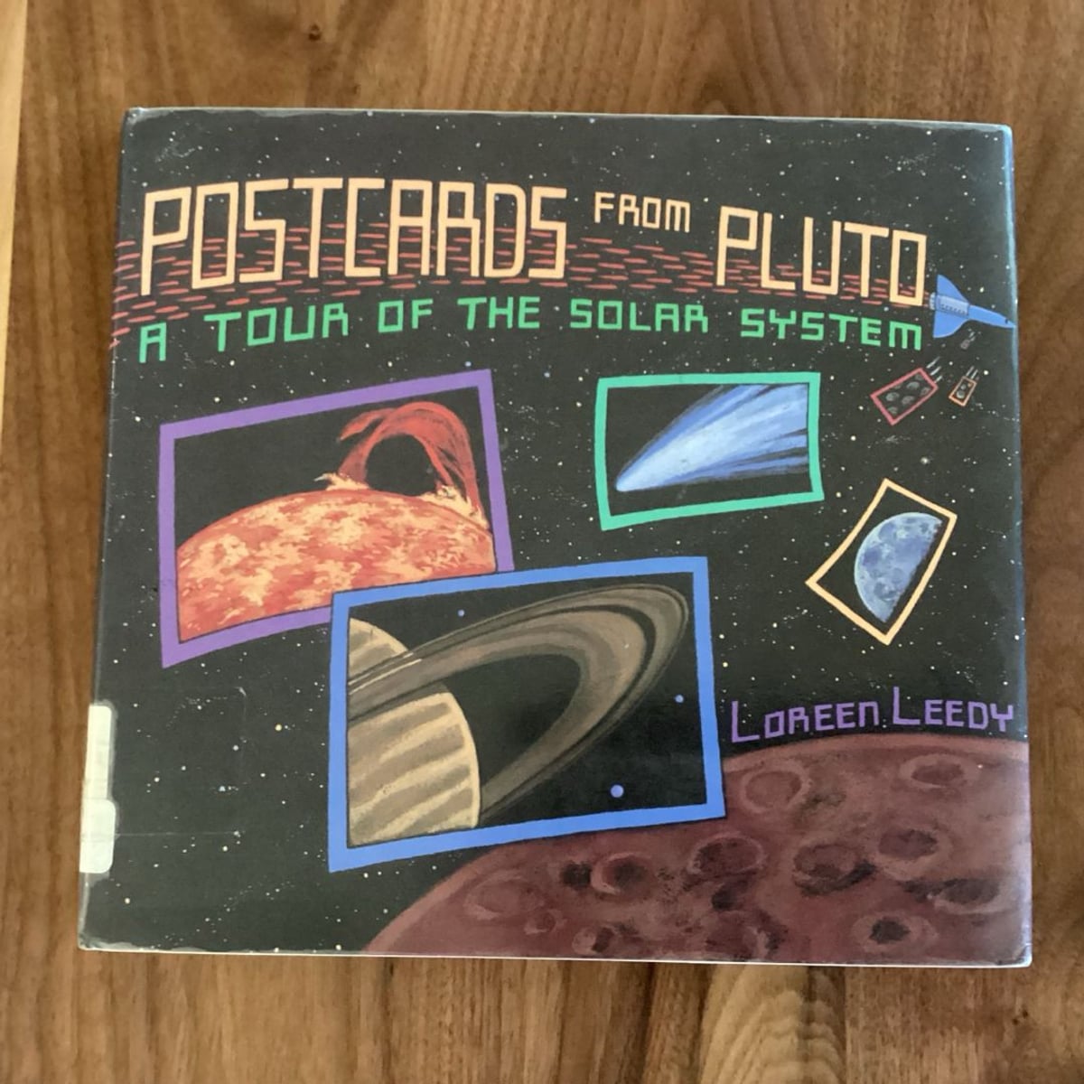 Postcards from Pluto: A Tour of the Solar System by Loreen Leedy