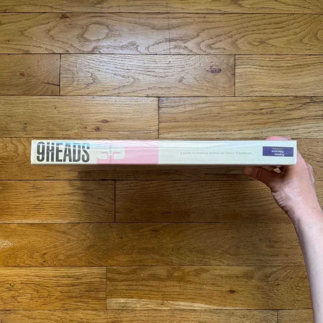 9 Heads by Nancy Riegelman