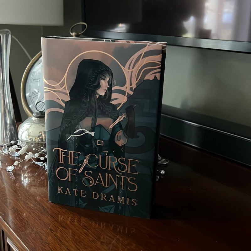 The Curse of Saints by Kate Dramis, Hardcover | Pangobooks