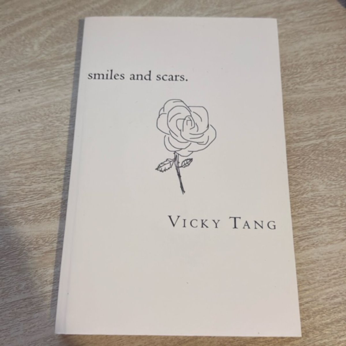 Smiles and Scars by Vicky Tang