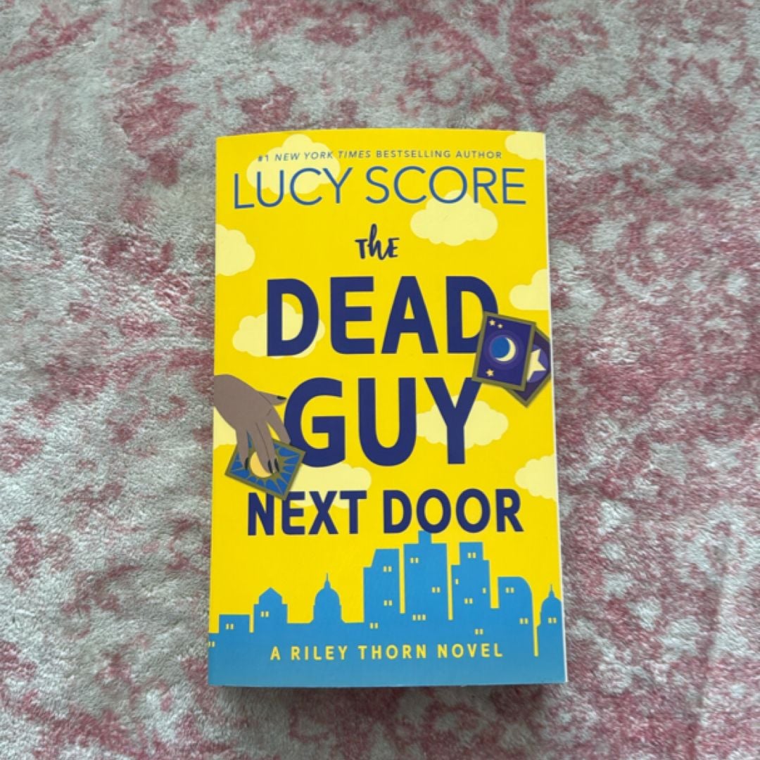 The Dead Guy Next Door by Lucy Score, Paperback | Pangobooks