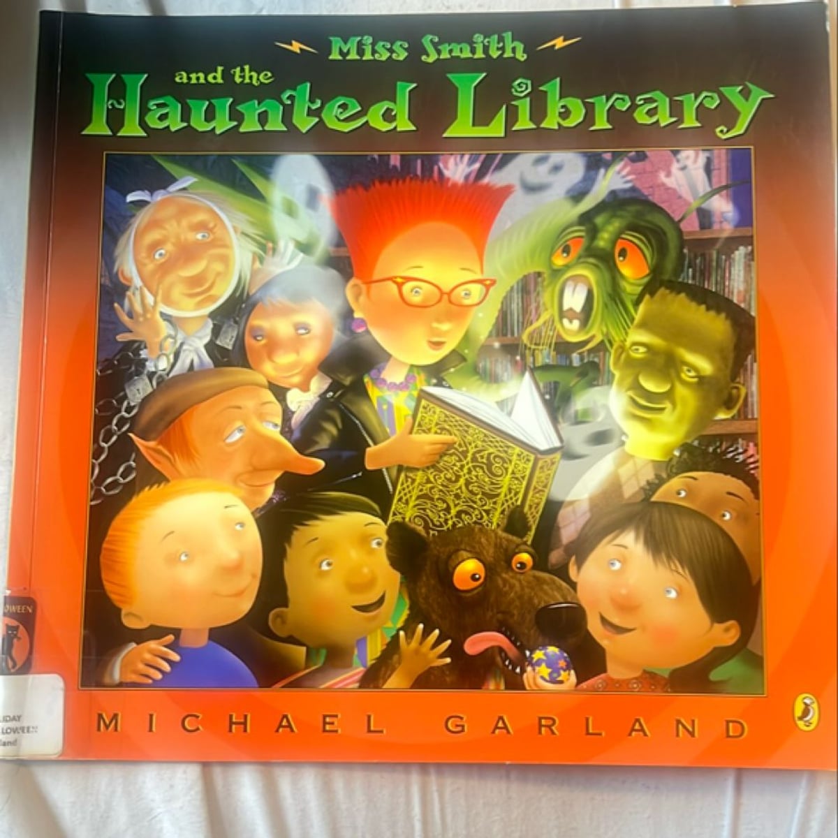 Miss Smith and the Haunted Library by Michael GARLAND