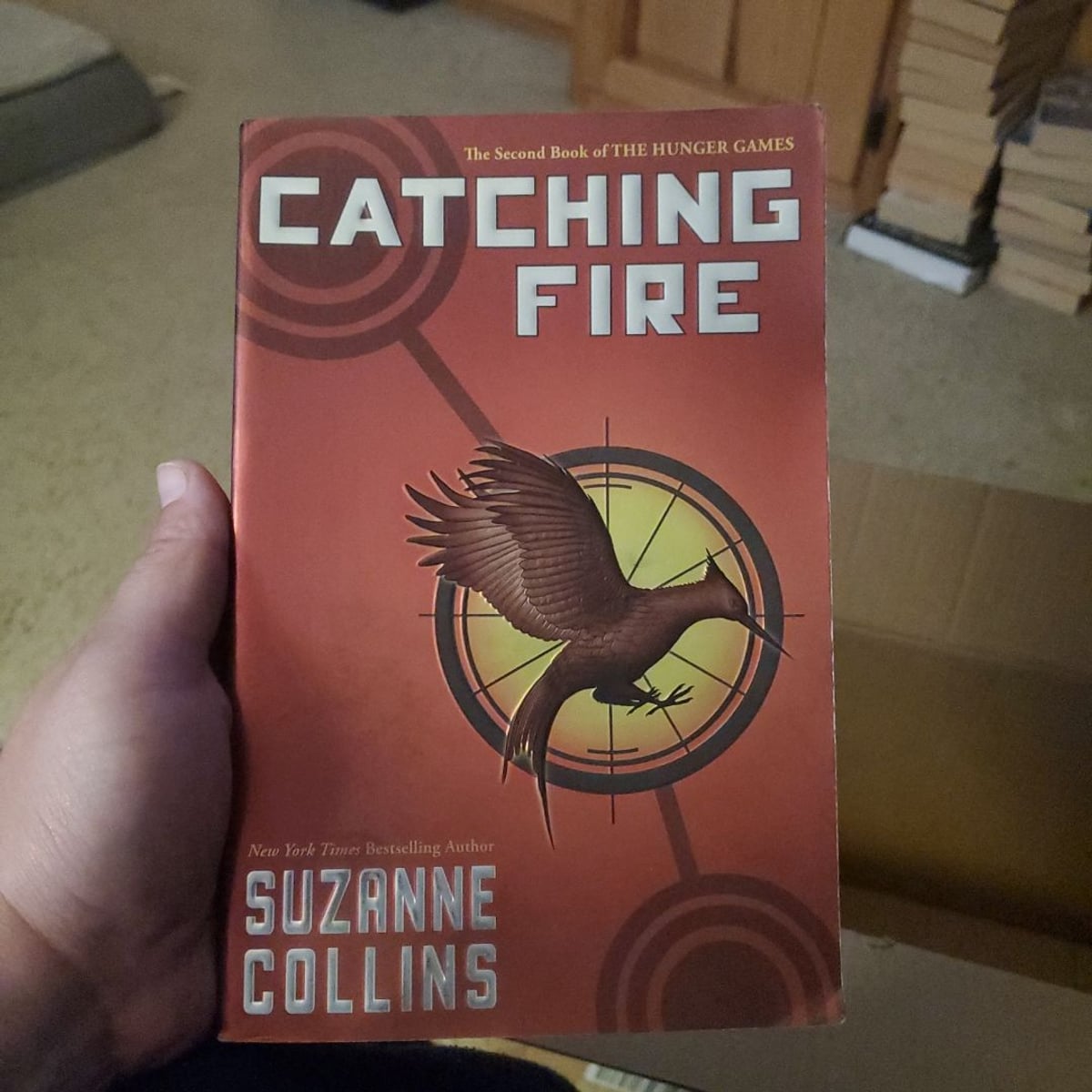 Catching fire by Suzanne collins , Paperback | Pangobooks