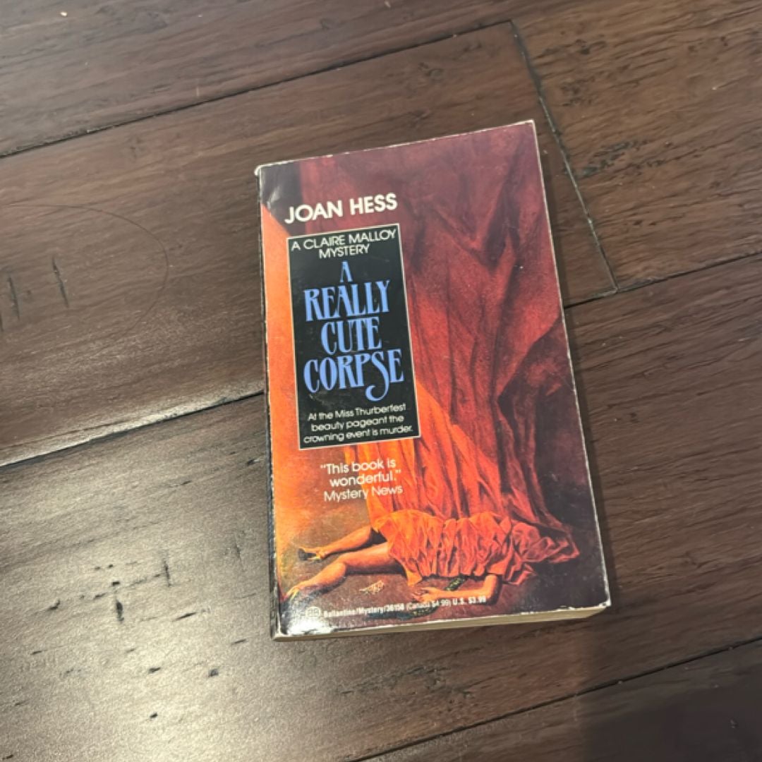 A Really Cute Corpse by Joan Hess, Paperback | Pangobooks