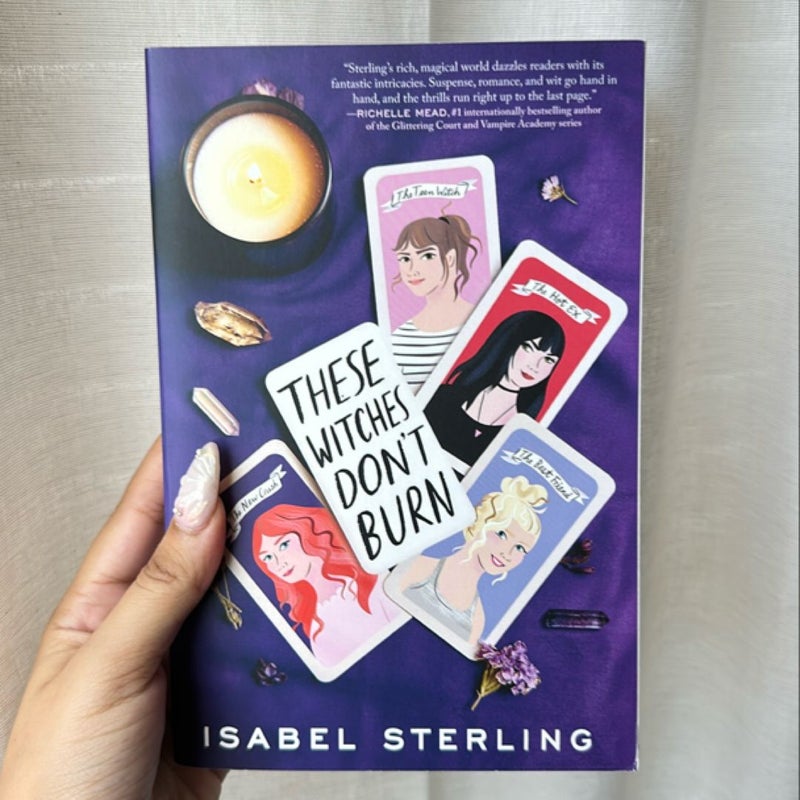 These Witches Don't Burn by Isabel Sterling