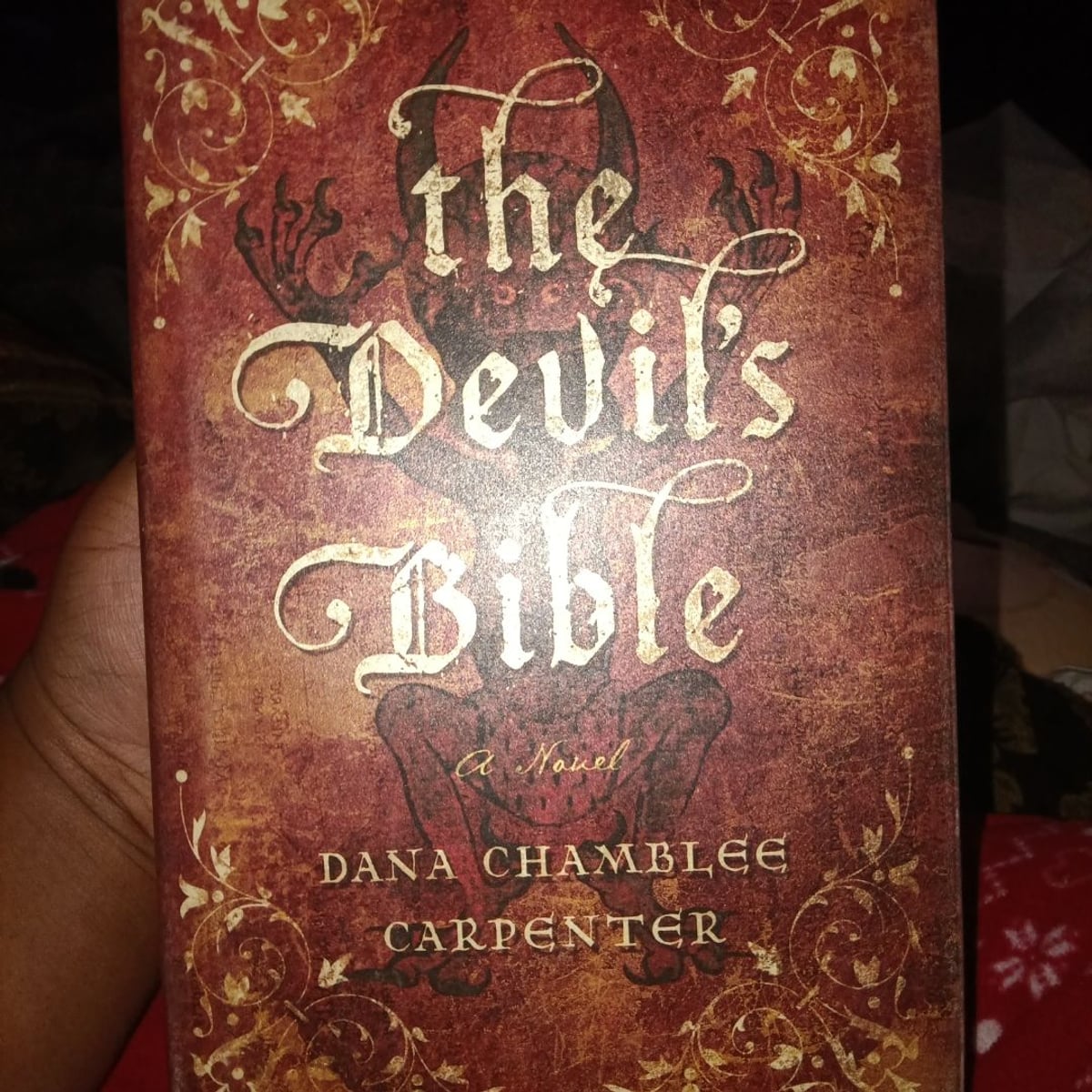 The Devil's Bible by Dana Chamblee Carpenter