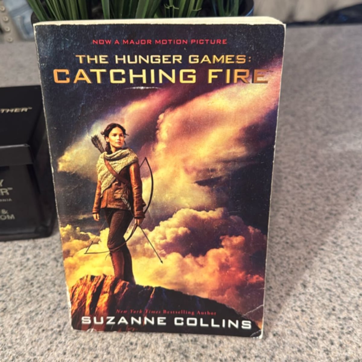 Catching Fire by Suzanne Collins, Paperback | Pangobooks