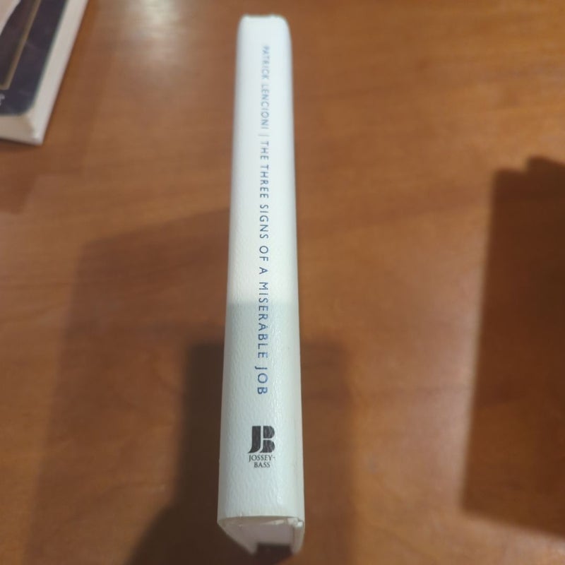 The Three Signs of a Miserable Job by Patrick Lencioni