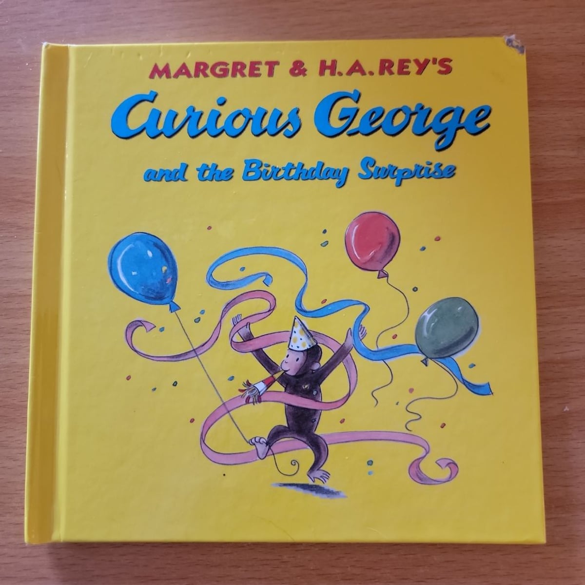 Curious George and the Birthday Surprise by H. A. Rey