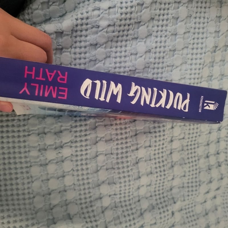 Pucking Wild by Emily Rath, Paperback | Pangobooks