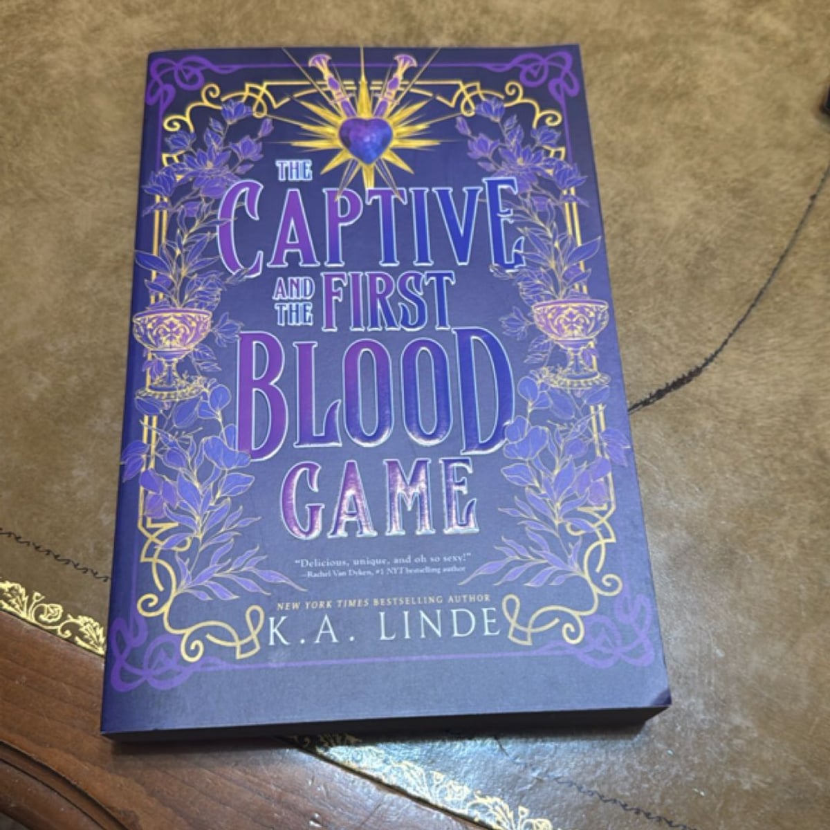The Captive and the First Blood Game by K. A. Linde
