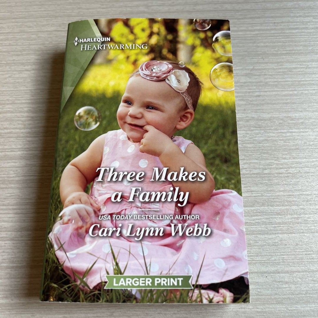 Three Makes a Family by Cari Lynn Webb, Paperback | Pangobooks