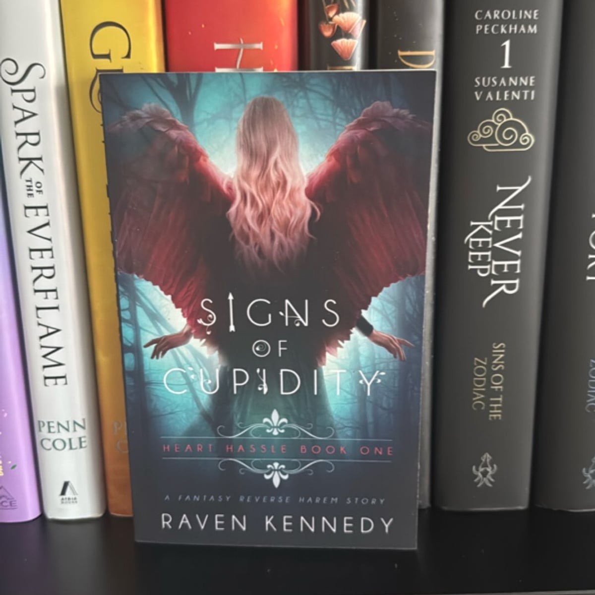 Signs of Cupidity by Raven Kennedy