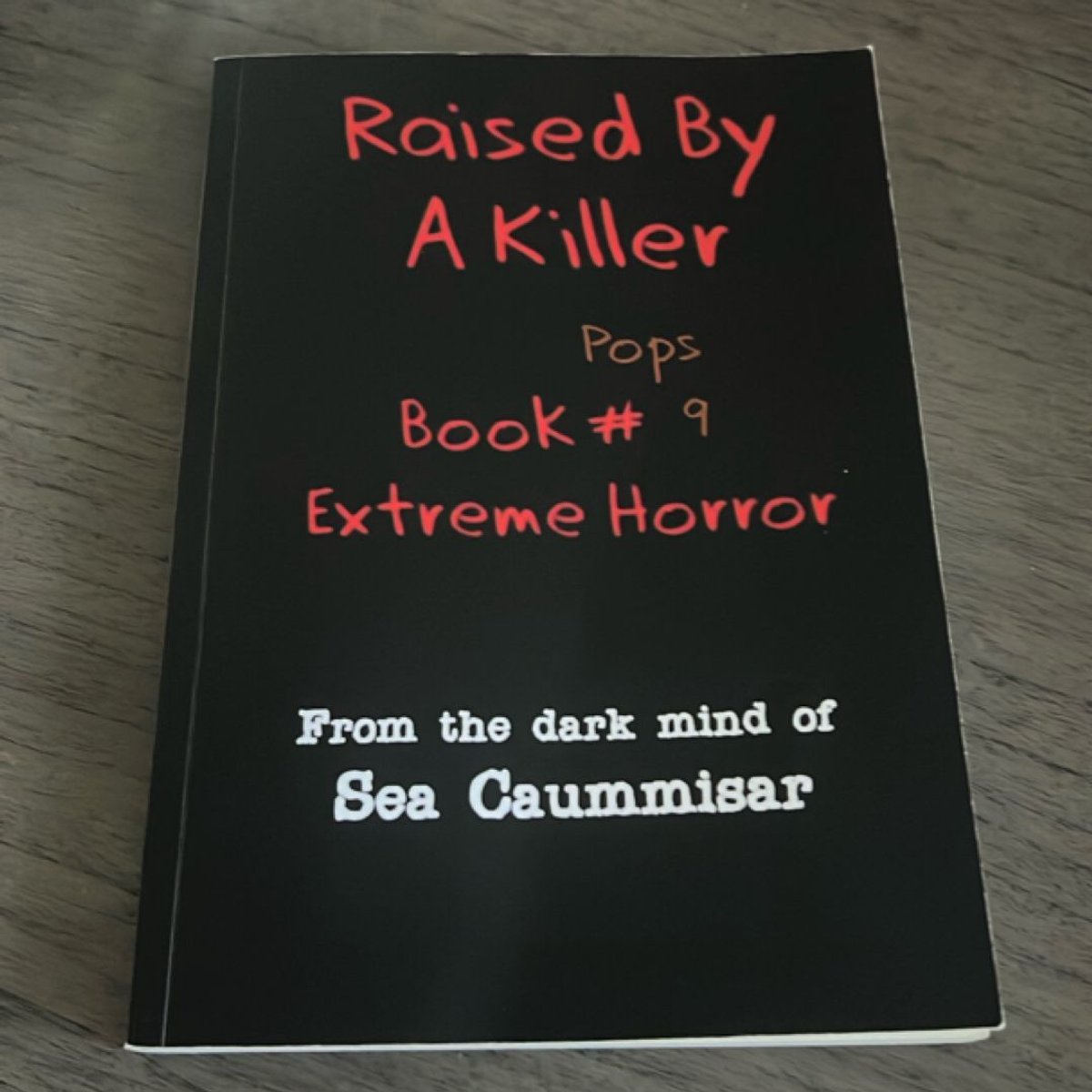 Raised by a Killer: Extreme Horror Book #9 Pops by Sea Caummisar