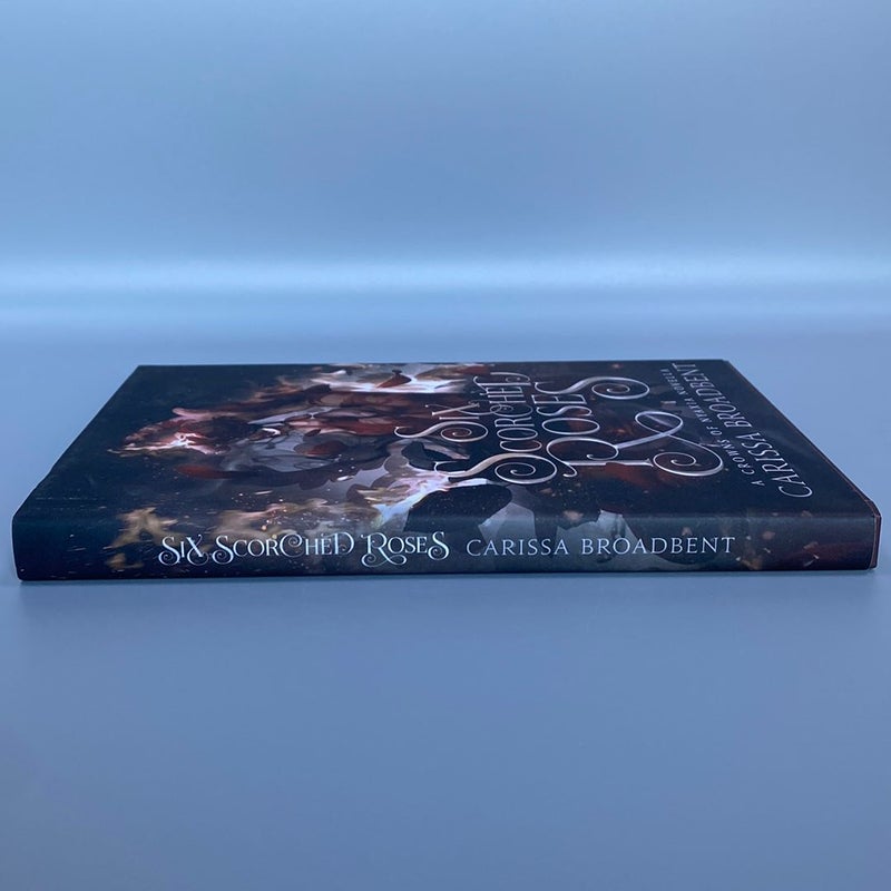 Six Scorched Roses by Carissa Broadbent