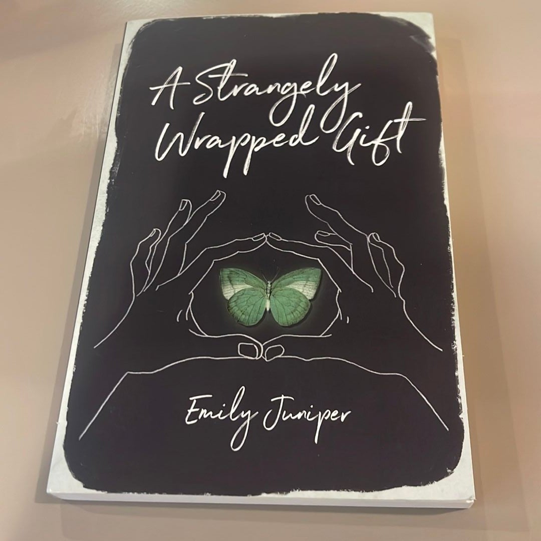 A Strangely Wrapped Gift by Emily Juniper