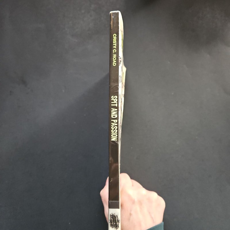 Spit and Passion by Cristy C. Road