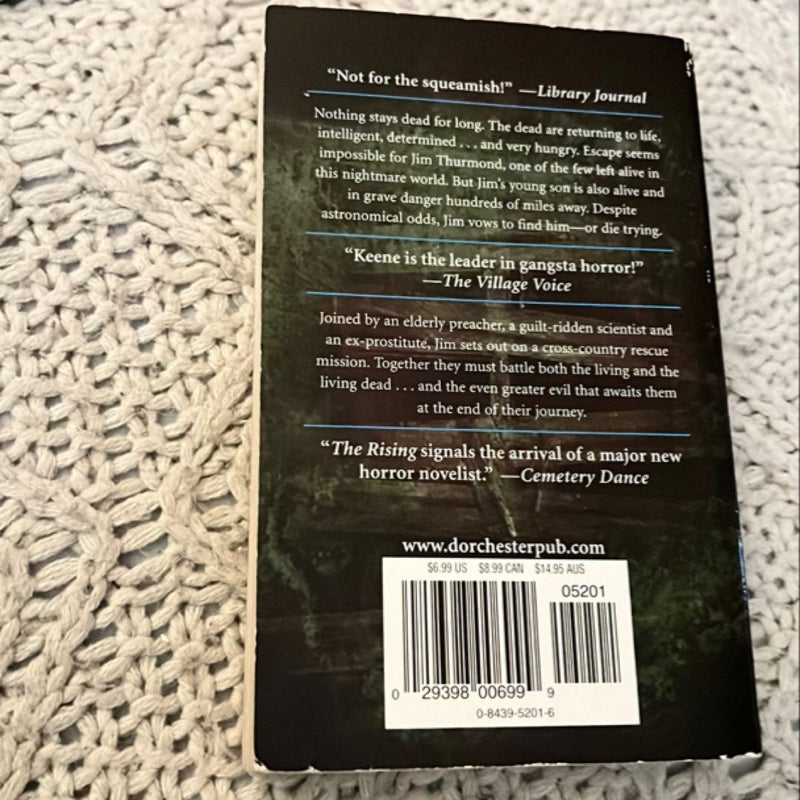 The Rising by Brian Keene, Paperback | Pangobooks