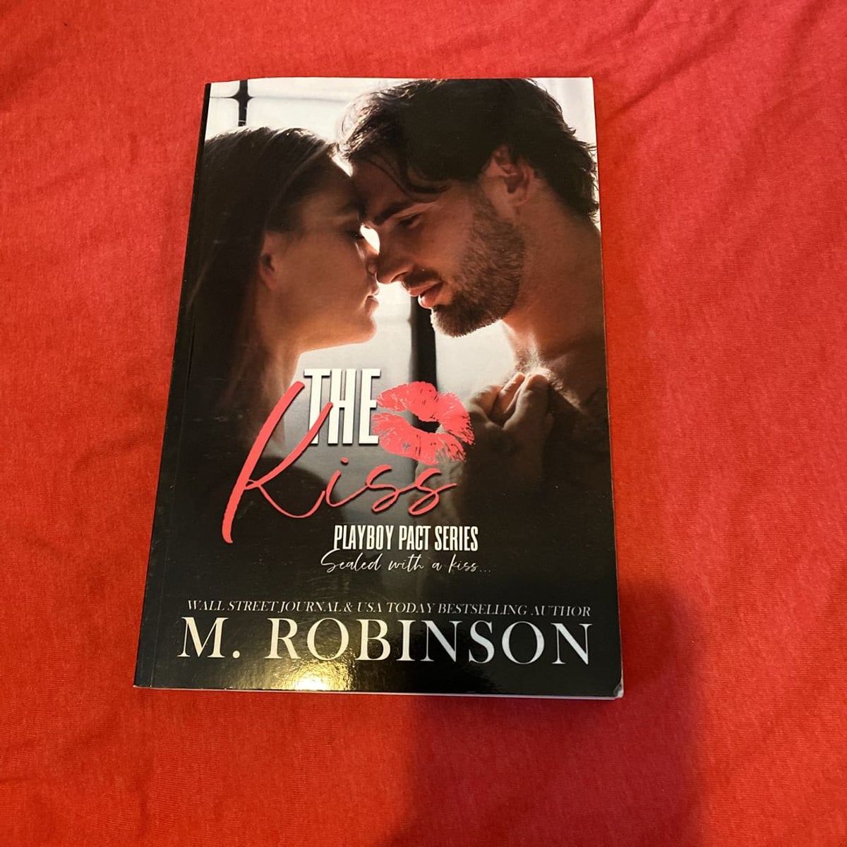 The Kiss by M. ROBINSON