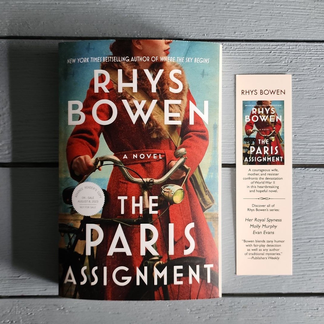 The Paris Assignment ARC by Rhys Bowen, Paperback | Pangobooks