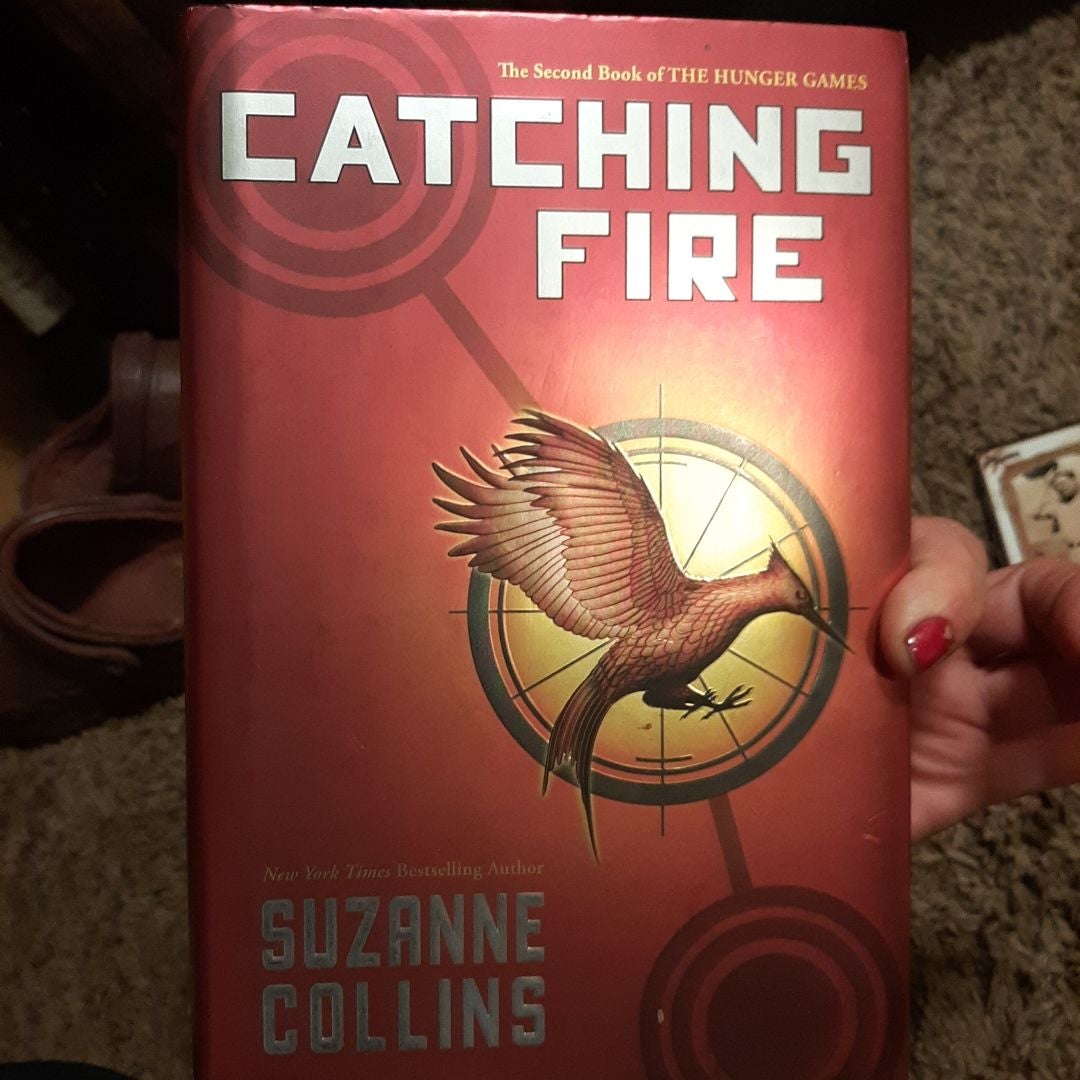 Catching Fire by Suzanne Collins, Hardcover | Pangobooks