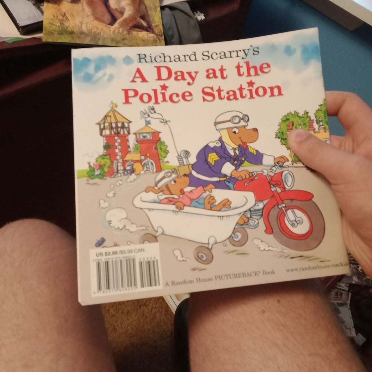 Richard Scarry's a Day at the Police Station by Richard Scarry