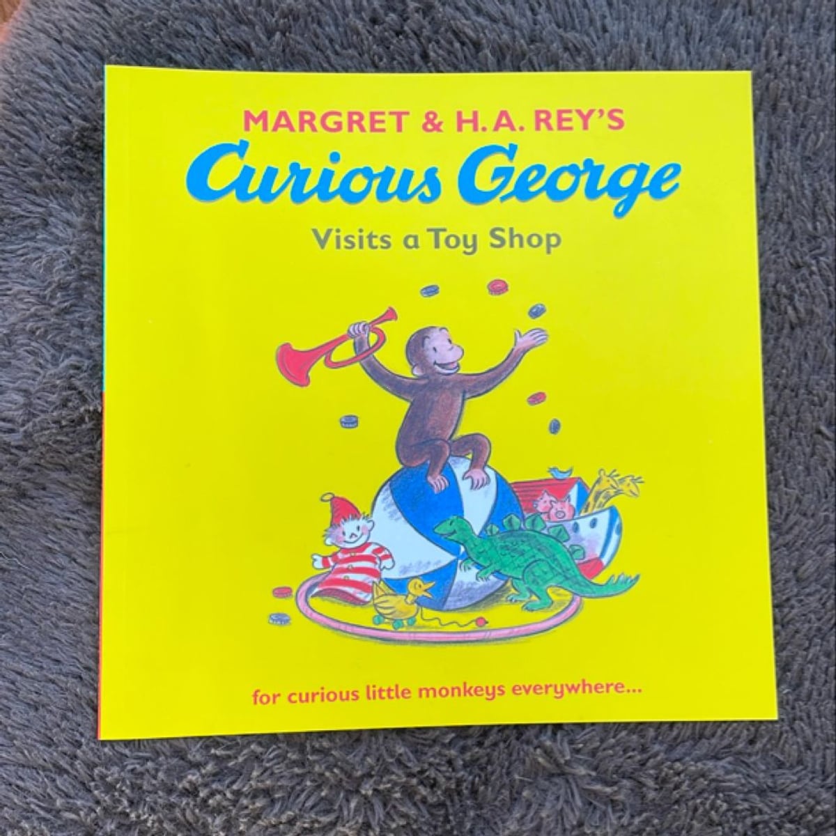 Curious George Visits a Toy Store by H. A. Rey, Margret Rey