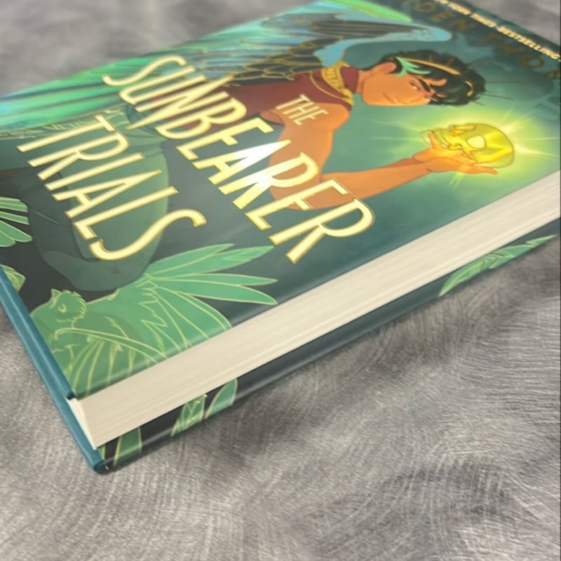 The Sunbearer Trials by Aiden Thomas, Hardcover | Pangobooks