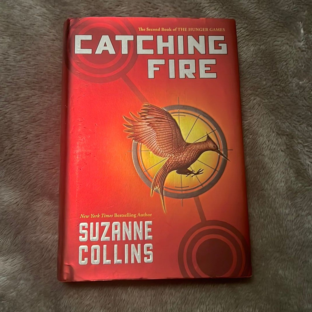 Catching Fire by Suzanne Collins, Hardcover | Pangobooks