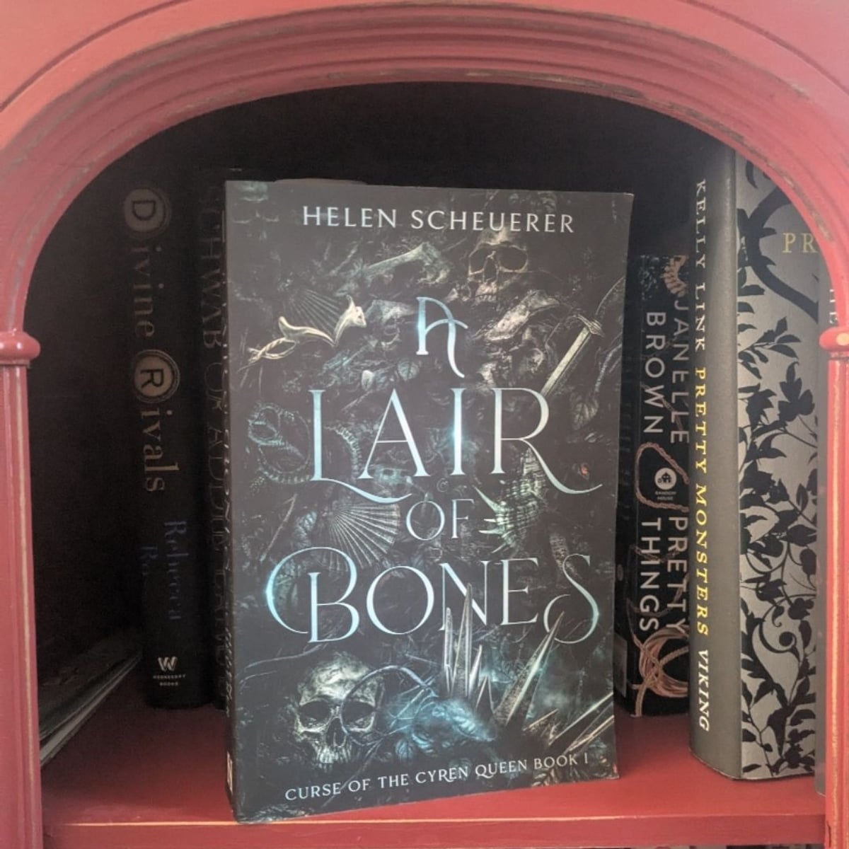 A Lair of Bones by Helen Scheuerer