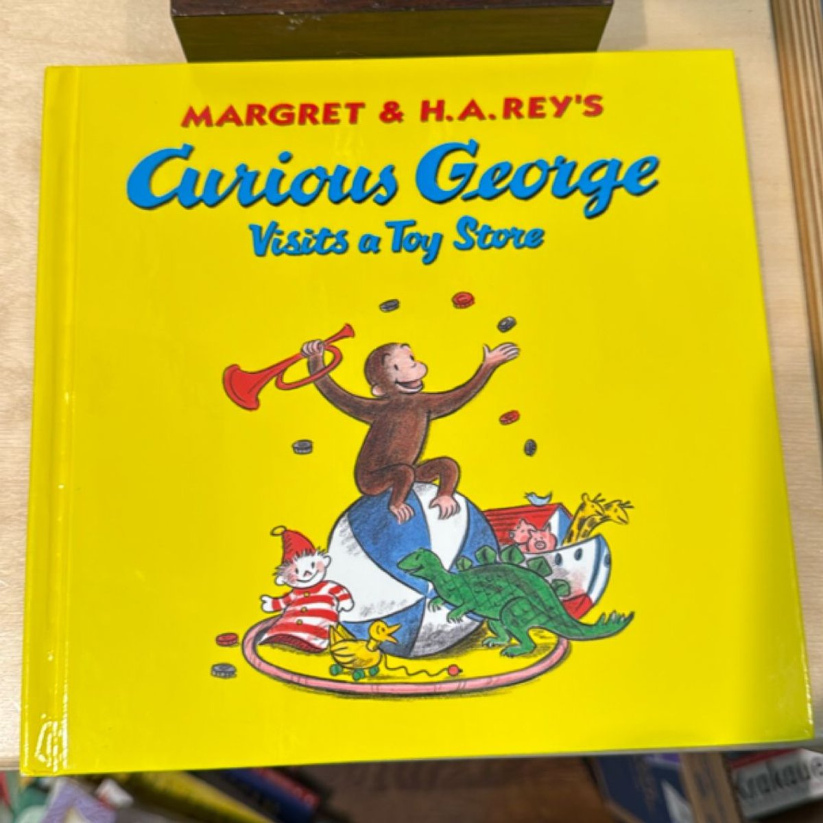 Curious George Visits a Toy Store by H. A. Rey, Margret Rey