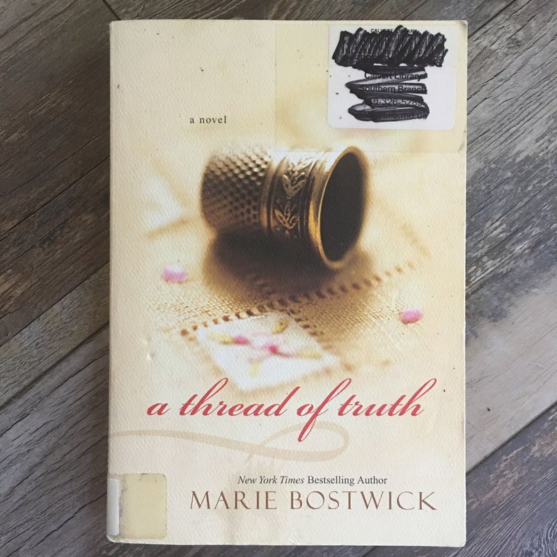 A Thread of Truth by Marie Bostwick