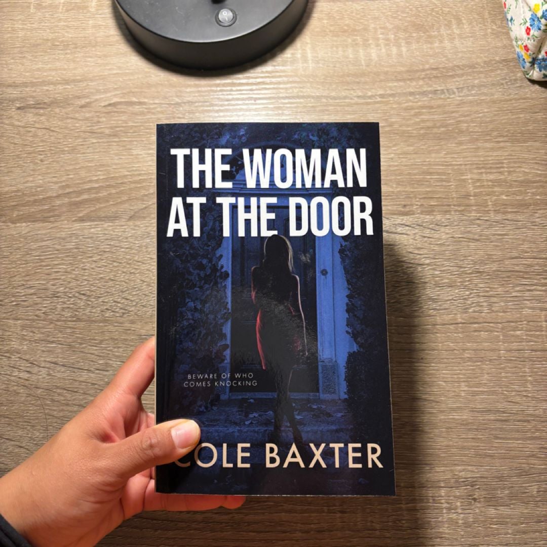 The Woman at the Door by Cole Baxter