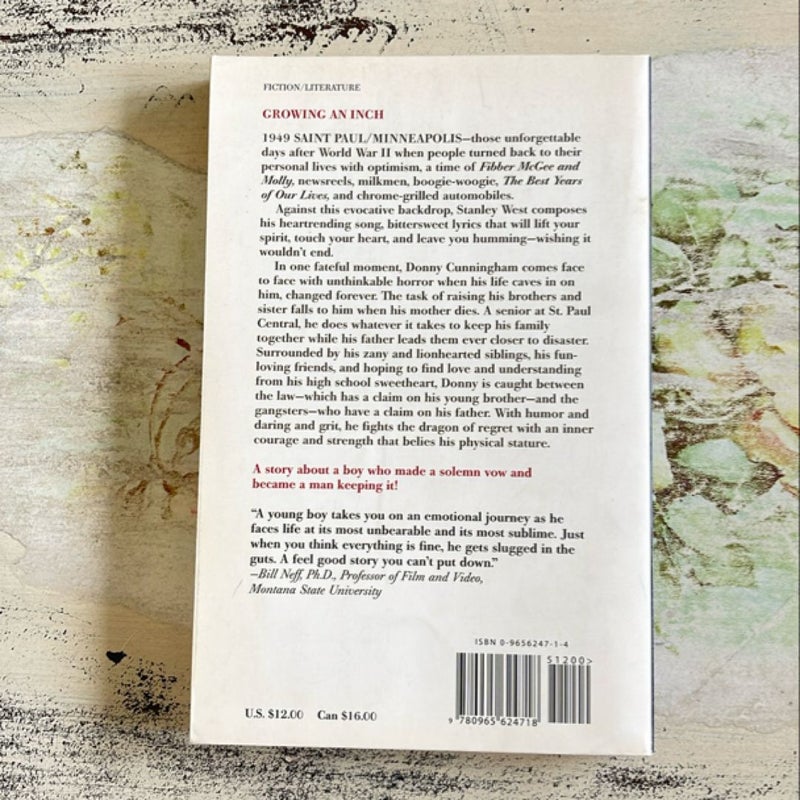 Growing an Inch by Stanley Gordon West, Paperback | Pangobooks