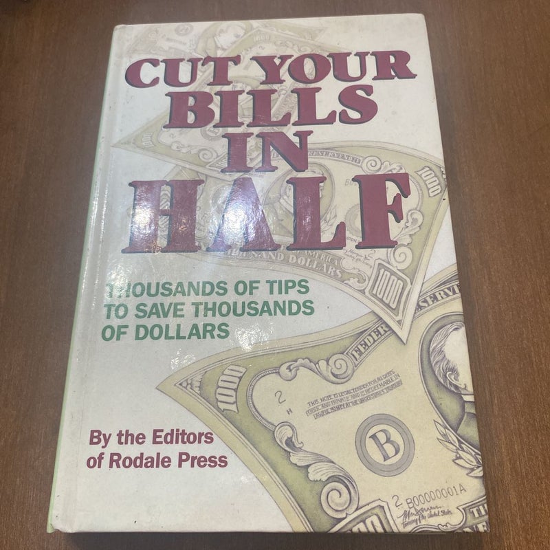 Cut Your Bills in Half by Rodale Press Staff