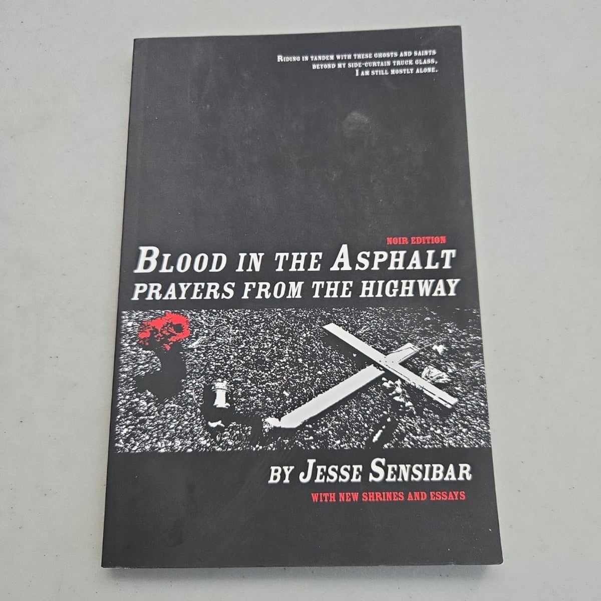 Blood in the Asphalt by Jesse Sensibar