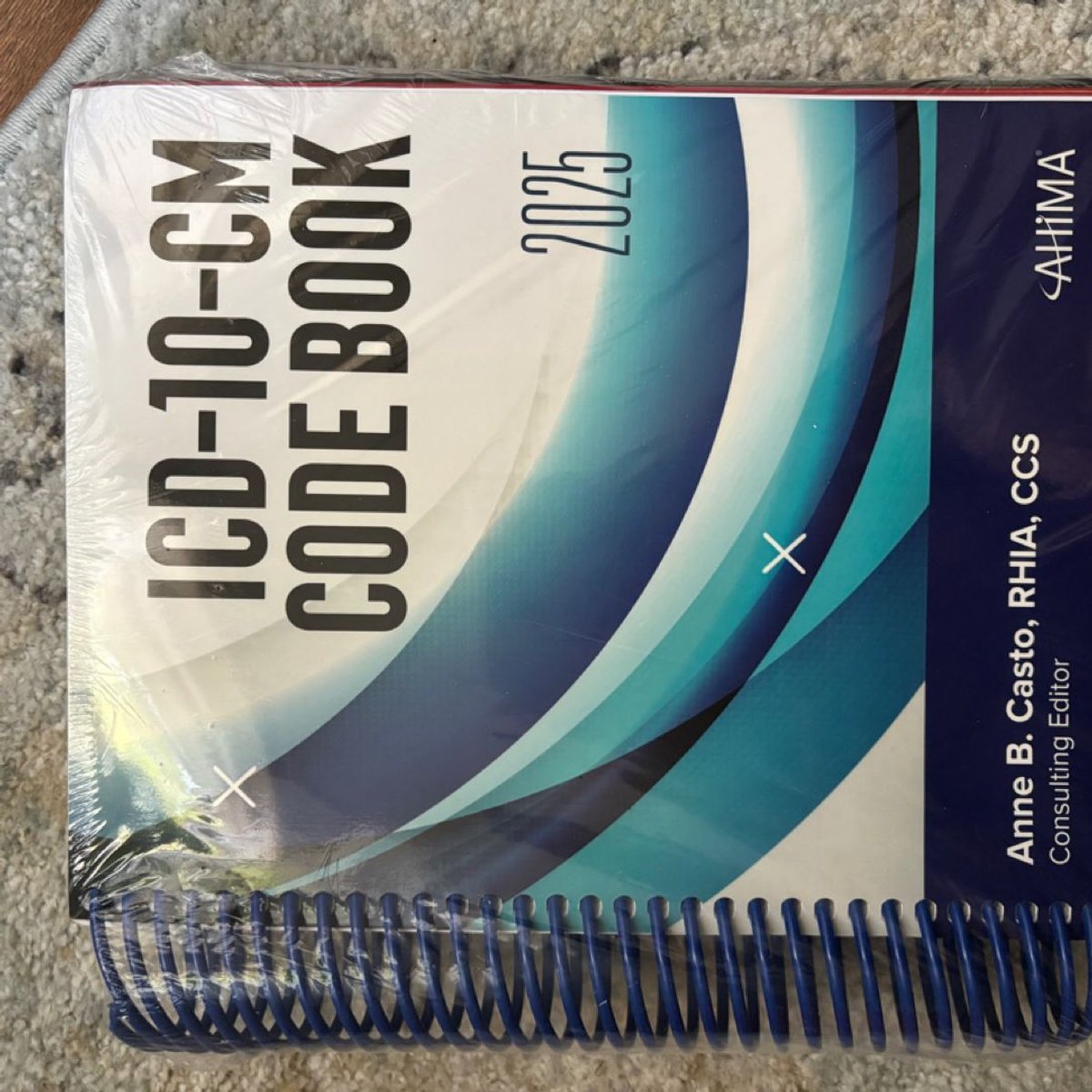 ICD-10-CM Code Book, 2025, Spiral Edition by Anne Castro