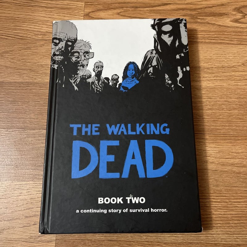 The Walking Dead by Robert Kirkman; Tony Moore; Charlie Adlard; Cliff ...