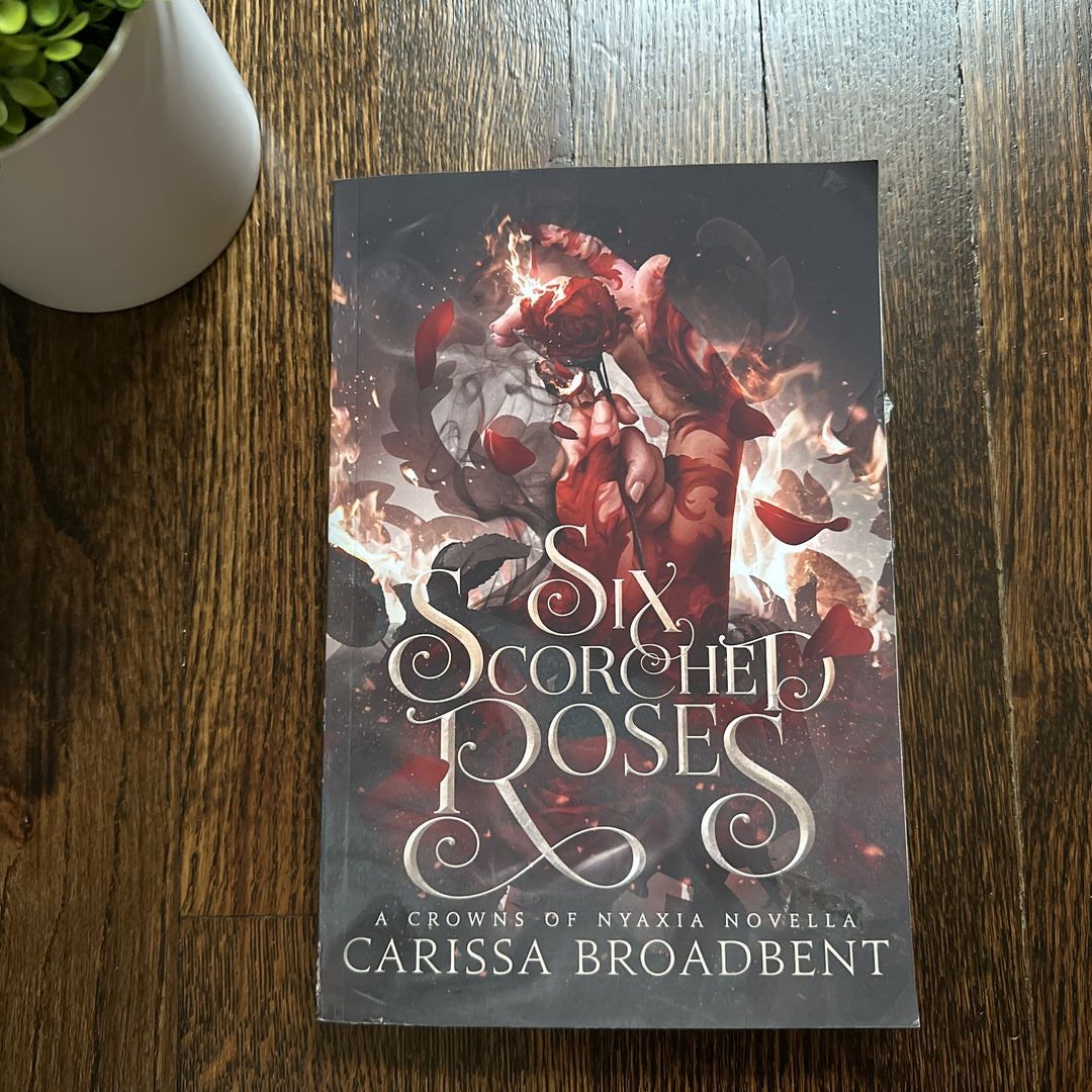 Six Scorchet Roses - A Crowns of Nyaxia Novella by Clarissa Broadbent ...