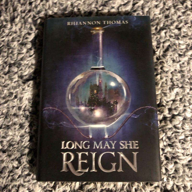 Long May She Reign by Rhiannon Thomas, Hardcover | Pangobooks