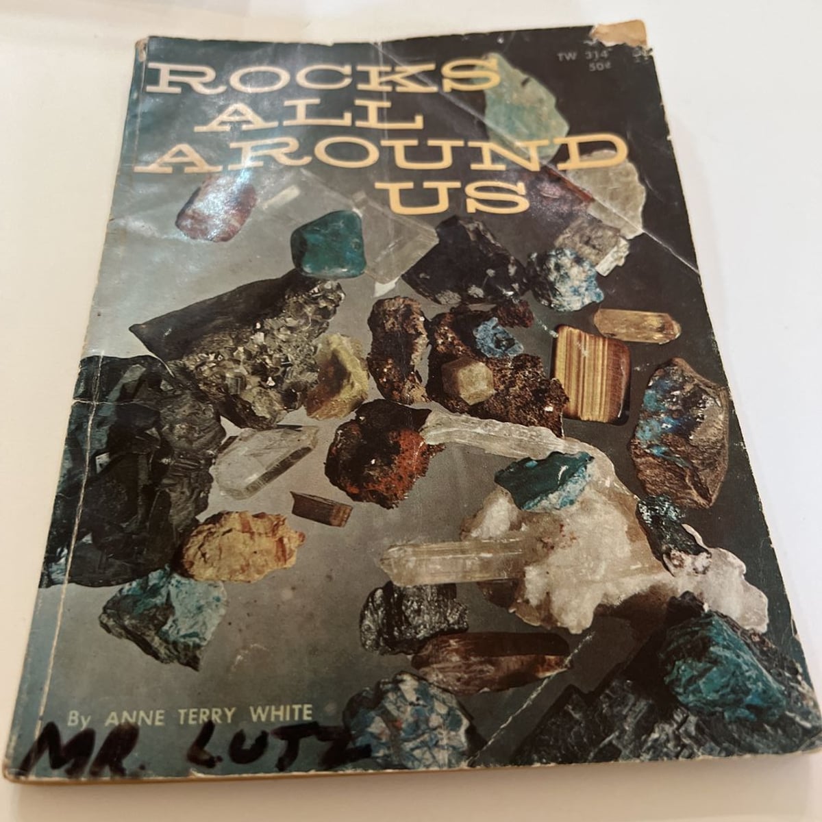Rocks All Around Us by Anne Terry White, Paperback | Pangobooks