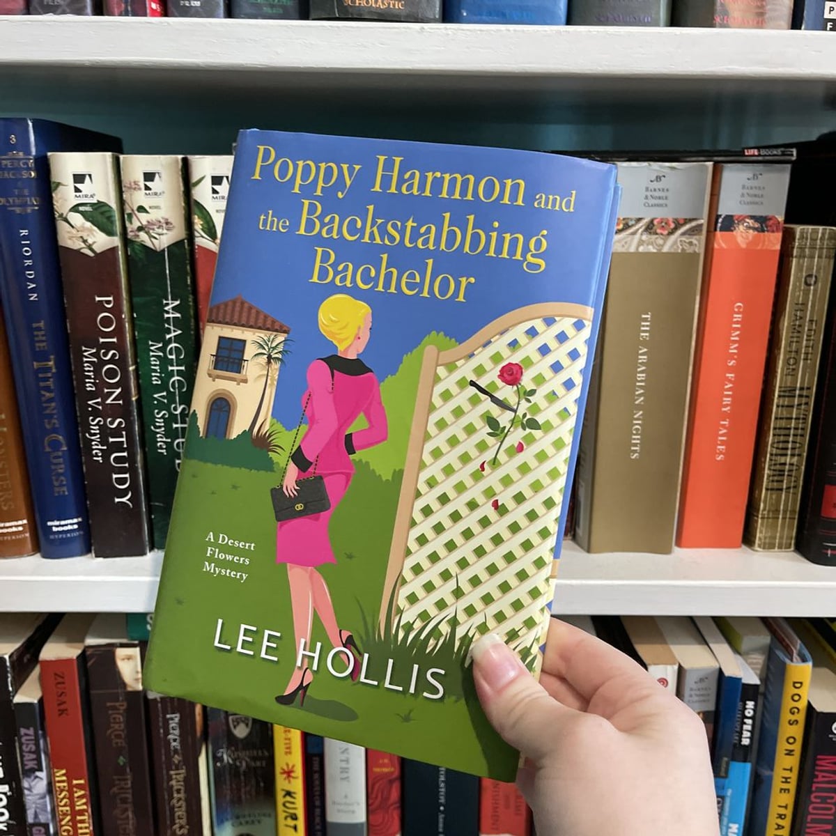 Poppy Harmon and the Backstabbing Bachelor by Lee Hollis