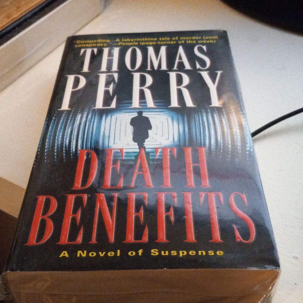 Death Benefits by Thomas Perry