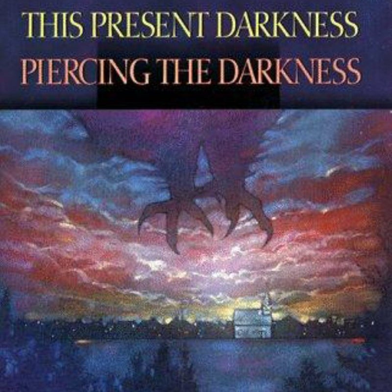 This Present Darkness and Piercing the Darkness by Frank E. Peretti ...